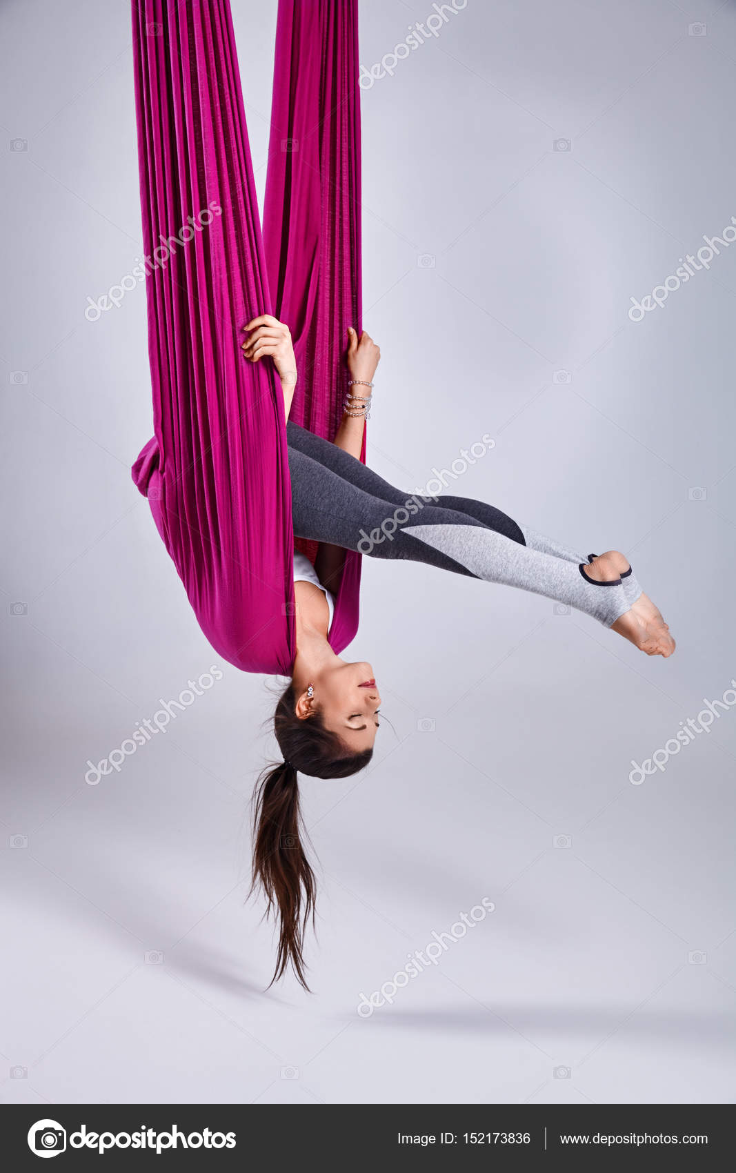 Aerial different inversion antigravity yoga in a hammock — Stock Photo ...
