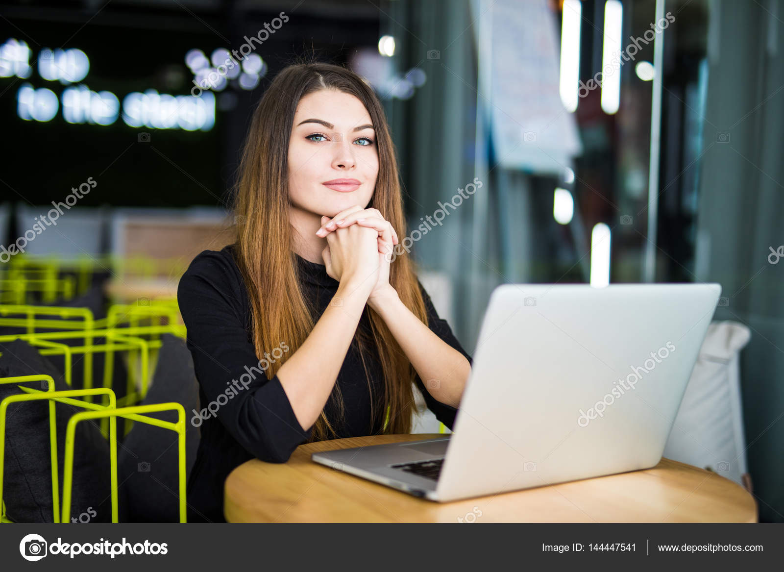 Working woman at smart space in modern office on laptop Stock Photo by ...