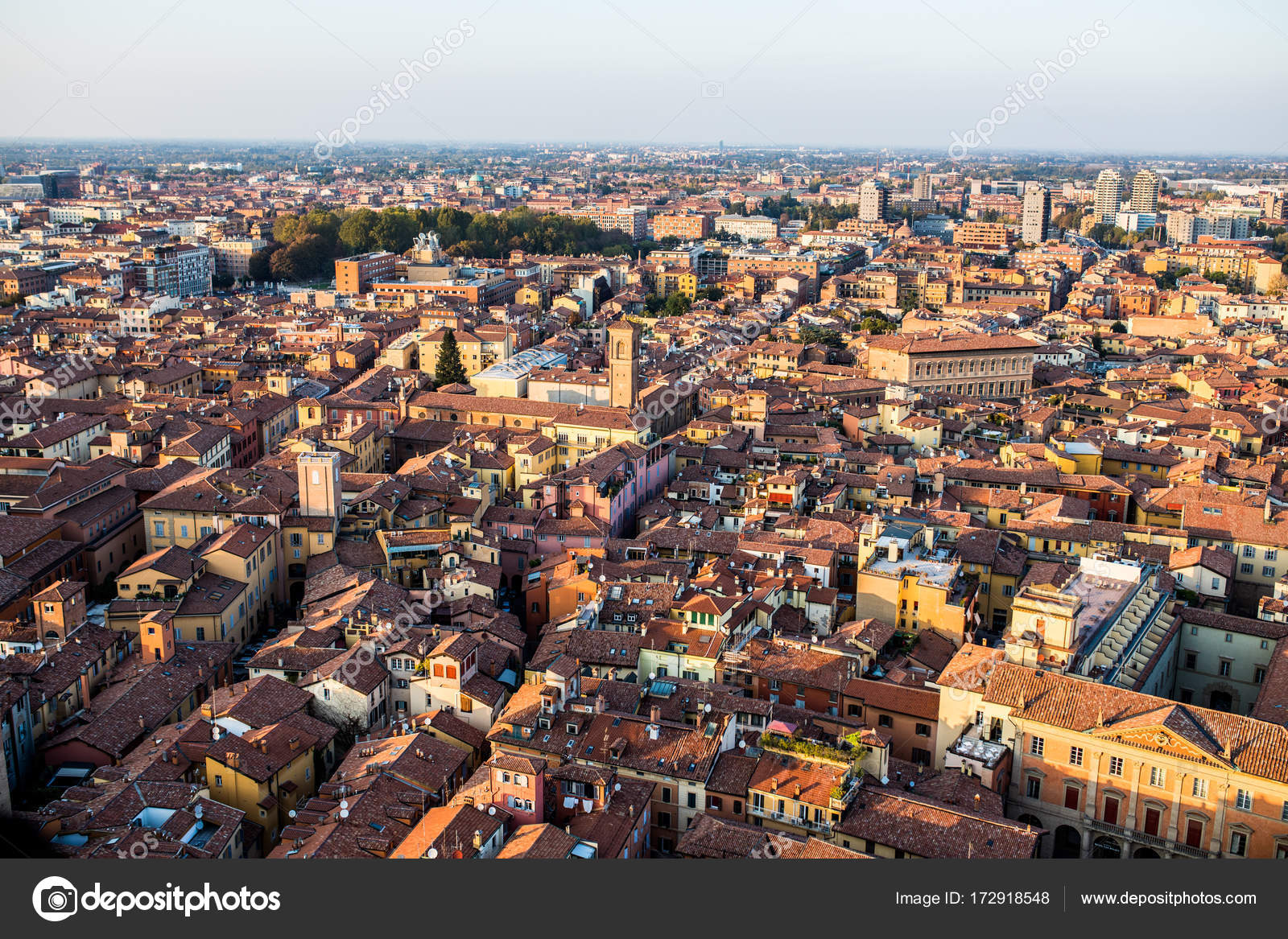 Aerial view of Bologna, Italy at sunset. Colorful sky over the ...