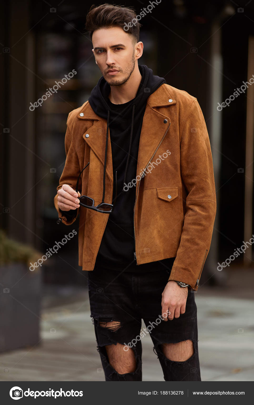 Model looking man stand on the city street with cars background, Stock ...