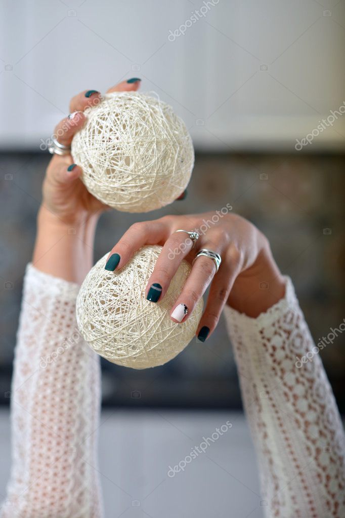 Female hands with manicure holding hands knitted balls. — Stock Photo ...