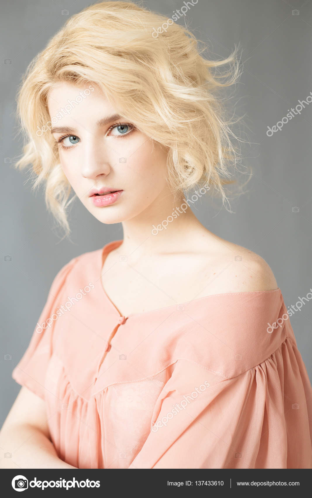 Young Blonde Woman With Blue Eyes Portrait Of A Beautiful Blonde Girl