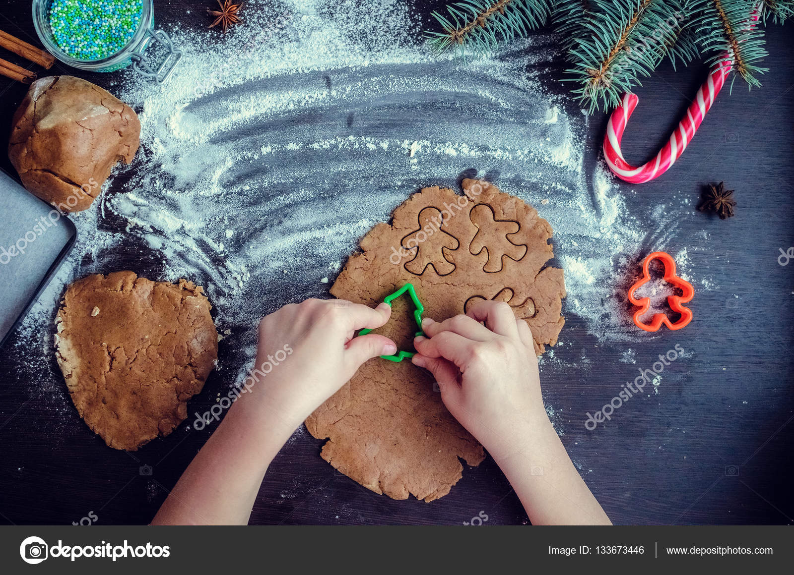 Little girl making Christmas cookies — Stock Photo © NelliSyr #133673446