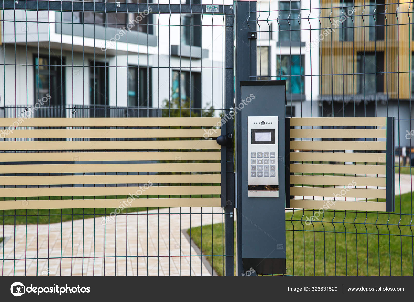 Video intercom on the gate at the entrance to the residential area ...