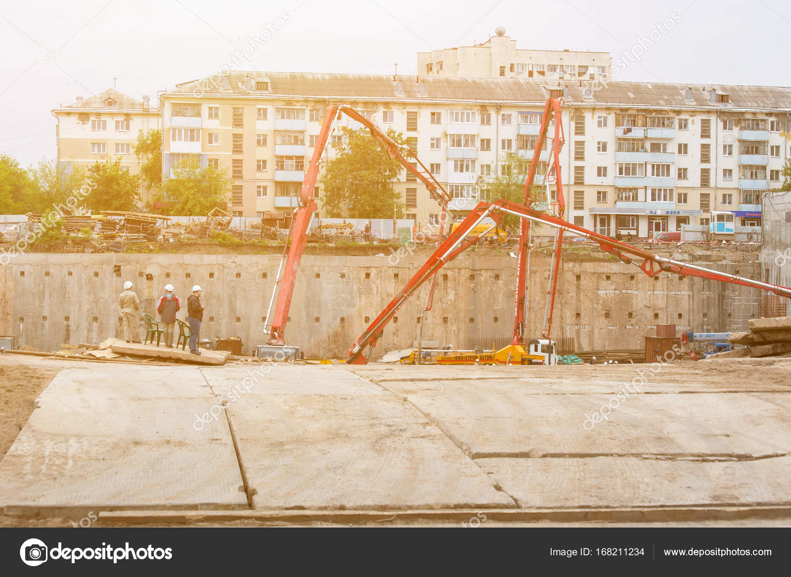 UFA, RUSSIA - MAY 21, 2016: Idel Tower. Construction trucks with ...