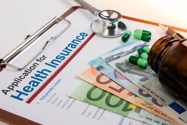 Application form for health insurance, paperwork, questionnaire, pen ...