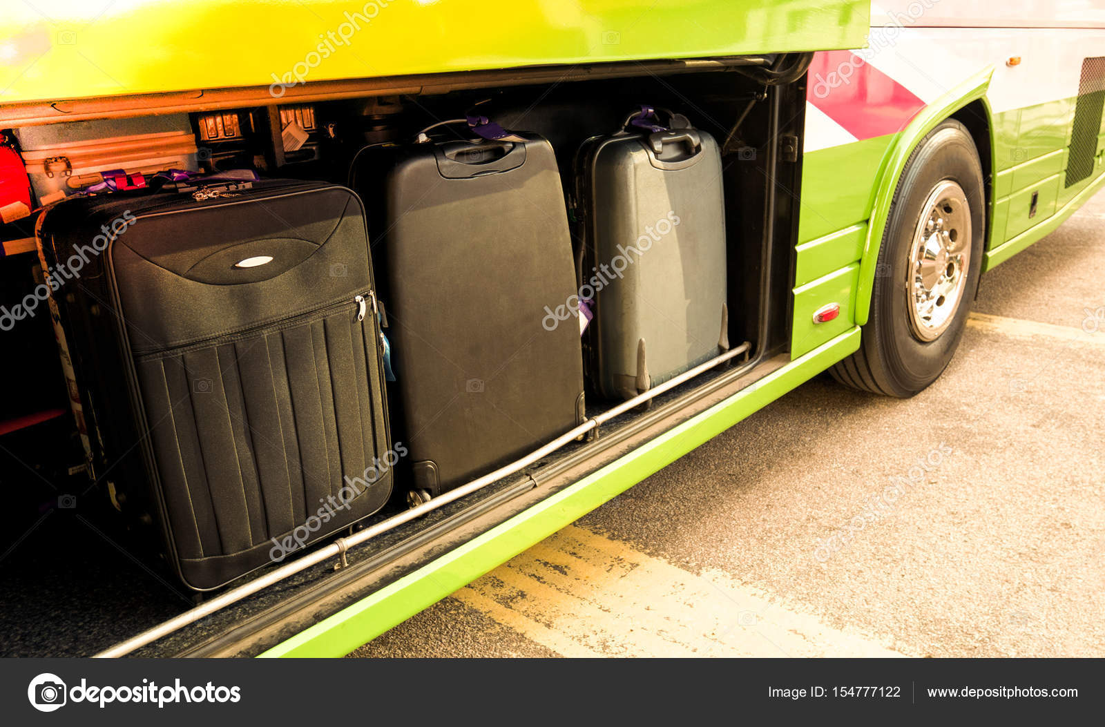 Checking luggage or suitcase compartment on bus. Many heavy luggage ...