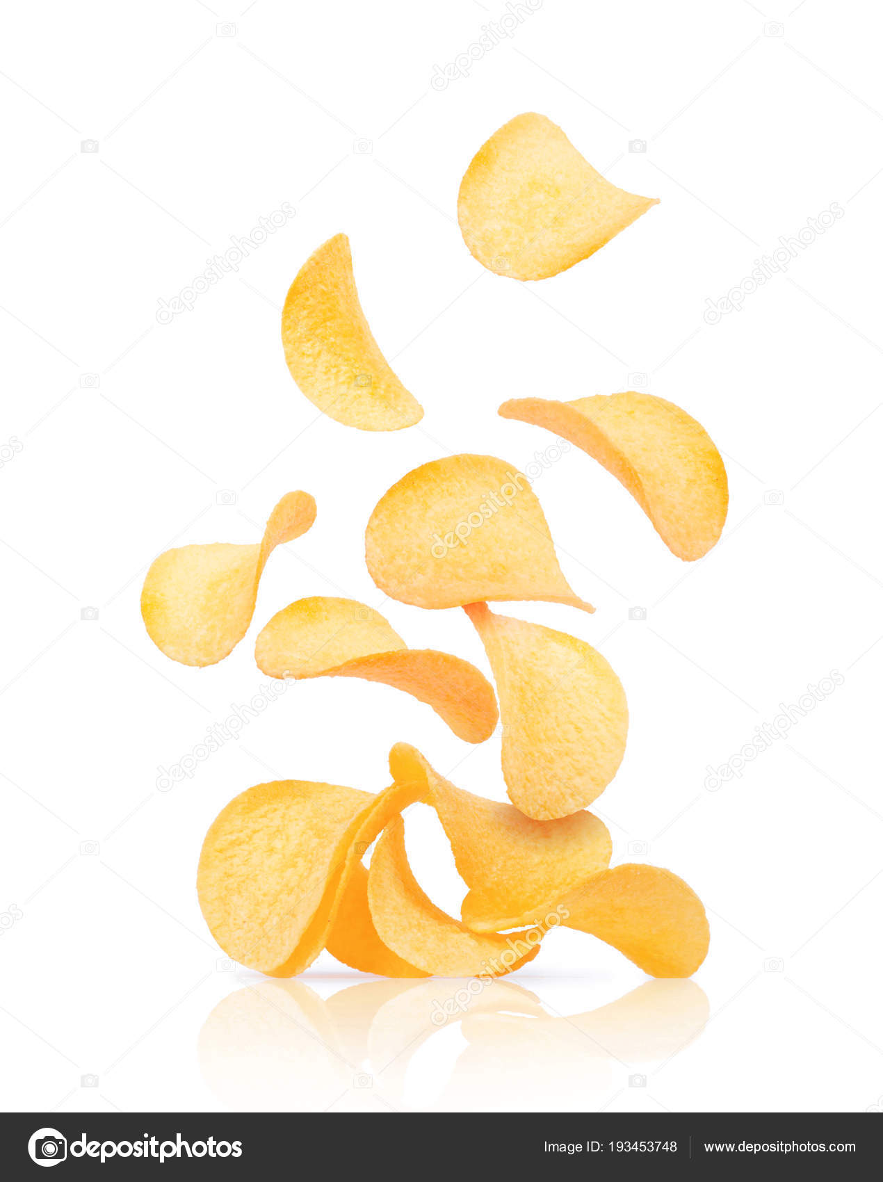 Potato chips fall on a heap with chips isolated on a white Stock Photo ...