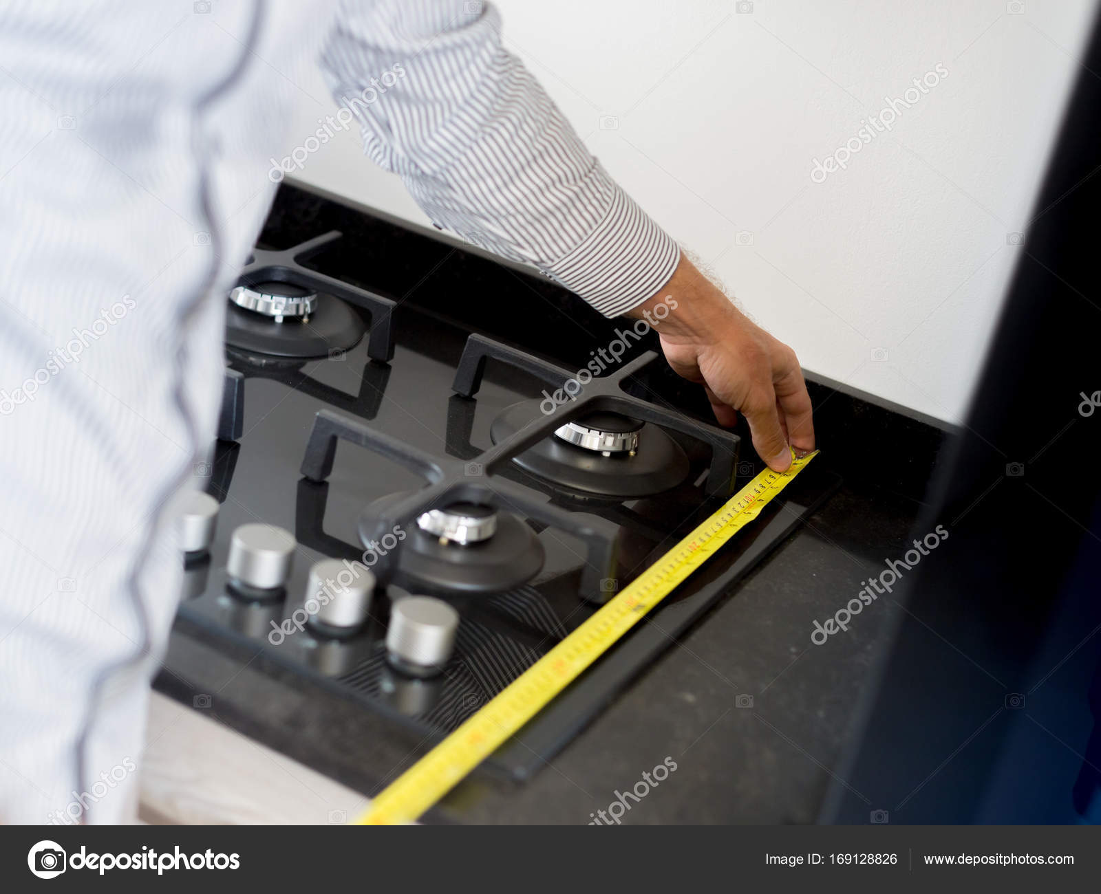 Architect at work taking measures Stock Photo by ©tostphoto 169128826