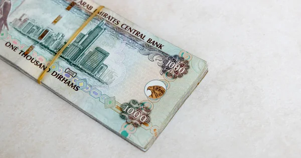 UAE one thousand Dirhams banknotes isolated on a bright backgrou Stock ...