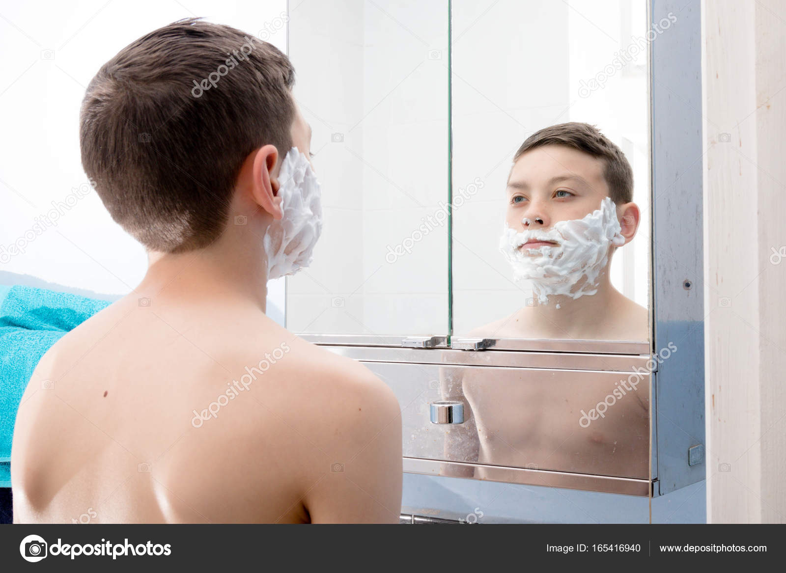 Young teenage boy shaving for the first time Stock Photo by ...
