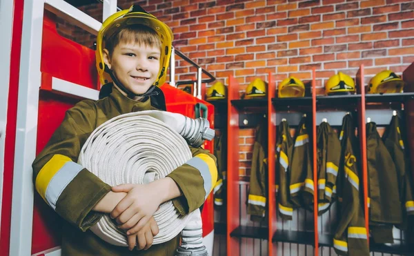 Child Firefighter play — Stock Photo © agnormark.gmail.com #170617656