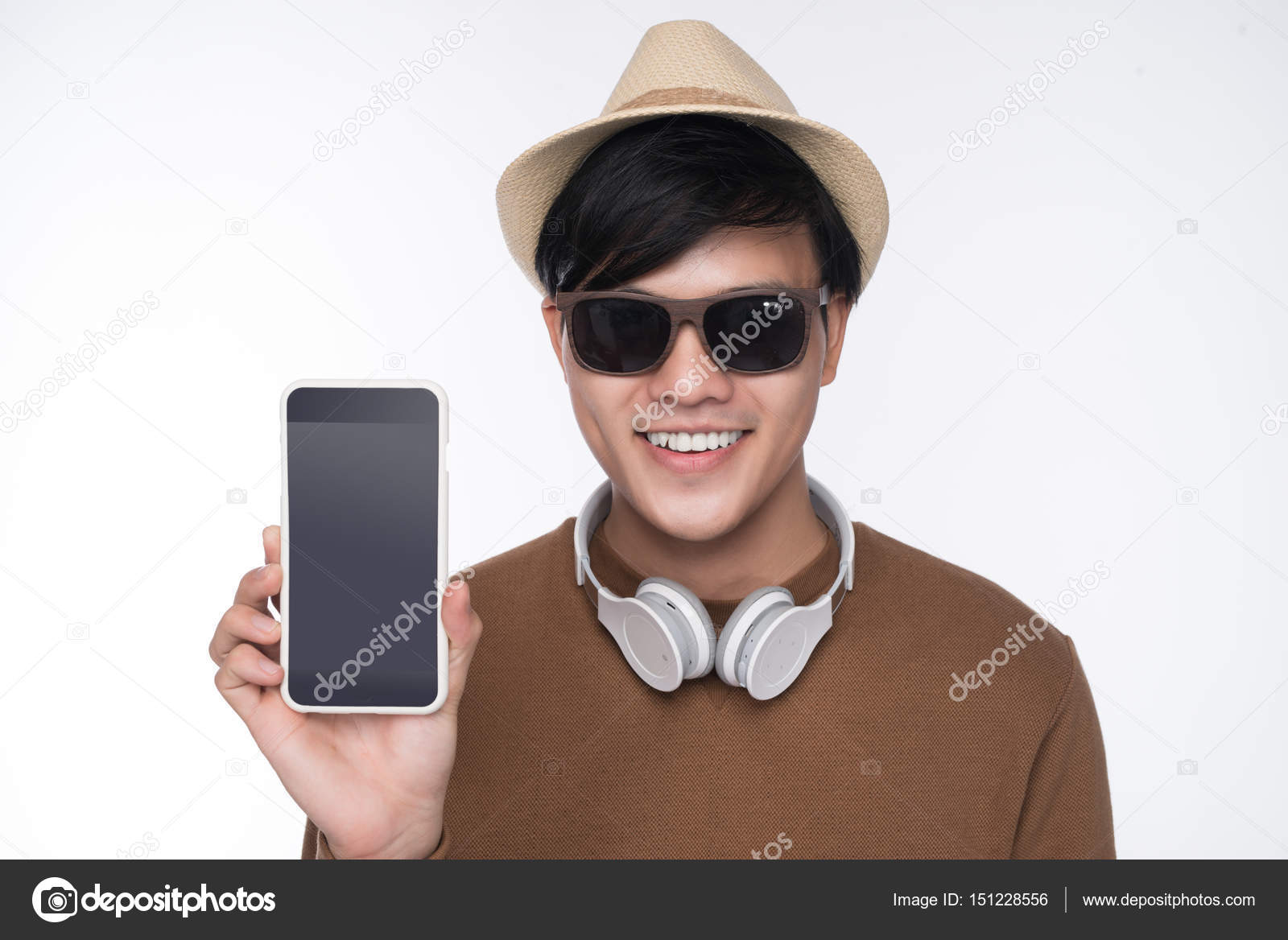 Man showing smartphone screen Stock Photo by ©makidotvn 151228556