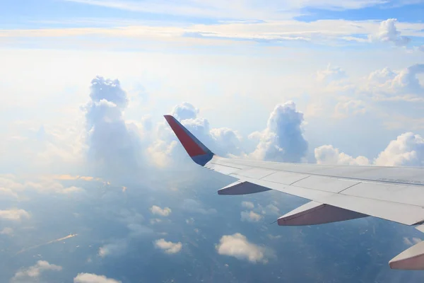 Looking over aircraft wing in flight — Stock Photo © luckybusiness #9919374