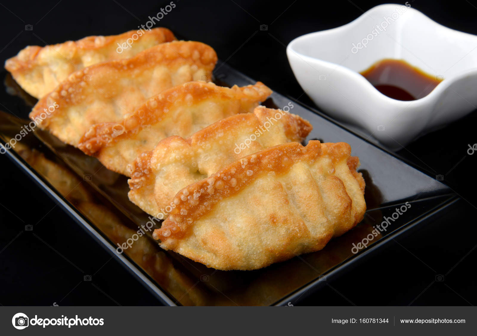 Deep fried gyoza crispy and golden colour. Stock Photo by ©lewzsan ...