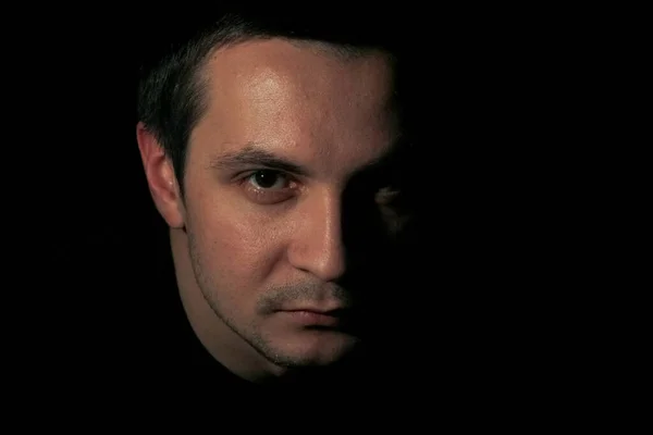 Low key portrait man Stock Photo by ©negativ 8728912