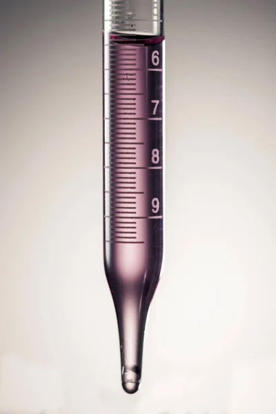 Laboratory graduated pipette isolated on white background - Stock Image ...