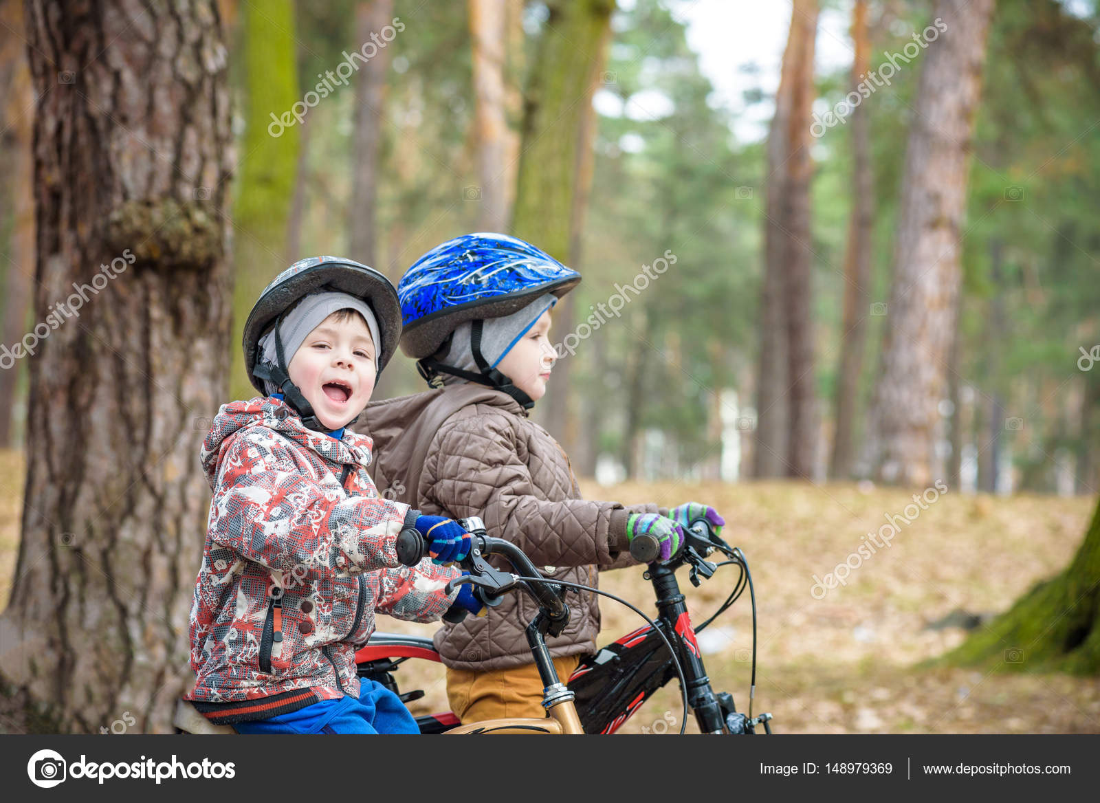 Young people riding bikes Stock Photo by ©pahis.ukr.net 148979369