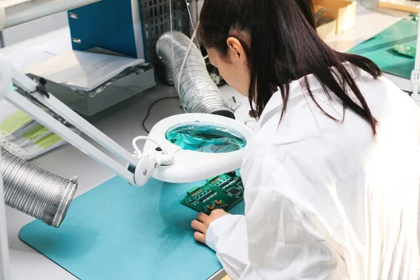 Microchip production factory. Technological process. Assembling the ...