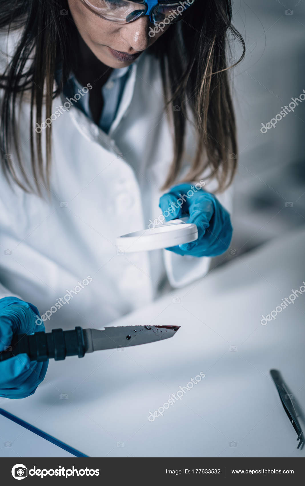 Forensic Science Lab Forensic Scientist Examining Knife Blood Evidences ...