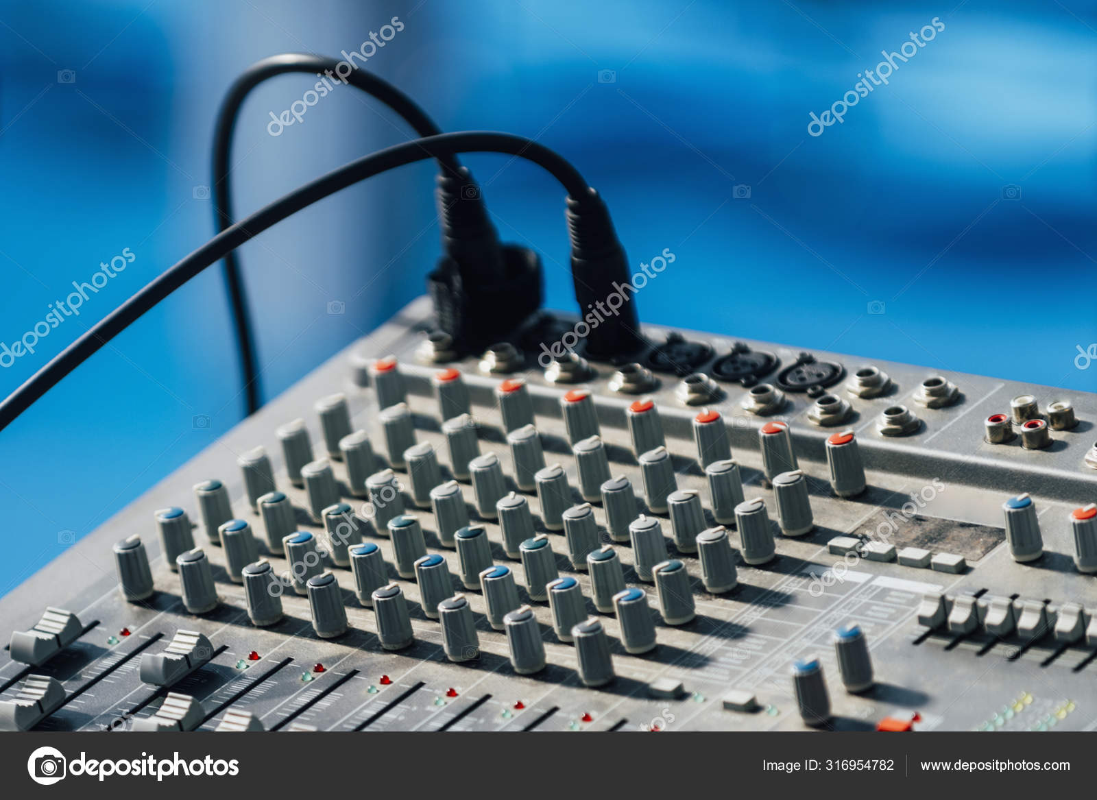 Audio Sound Mixer Blue Background Close Stock Photo by ©microgen 316954782