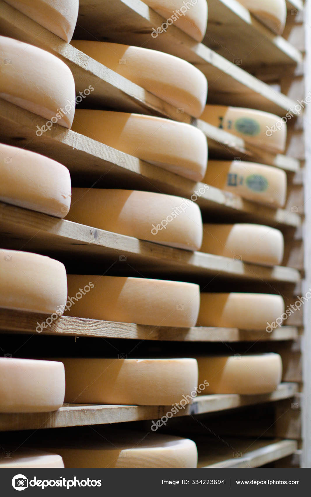 Stack of refining and aging cheese, French Comte wheels, France — Stock ...