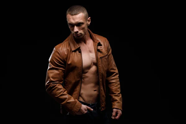 Muscular man in leather jacket Stock Photos, Royalty Free Muscular man ...