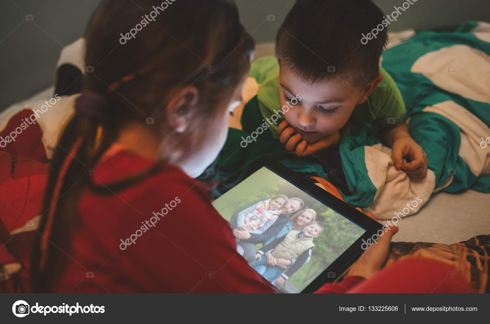Children using digital tablet — Stock Photo © mavoimages #133225606 Children using digital tablet — Stock Photo © mavoimages #133225606