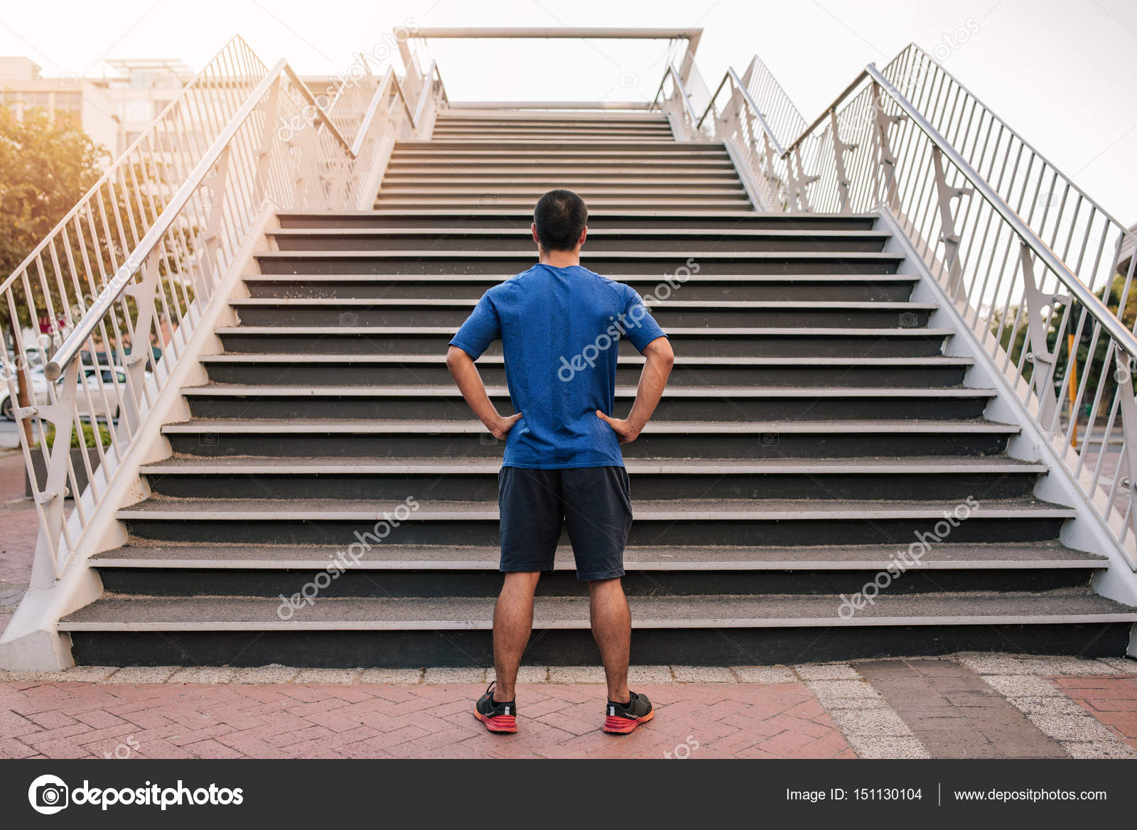 Man at bottom of set of stairs Stock Photo by ©mavoimages 151130104