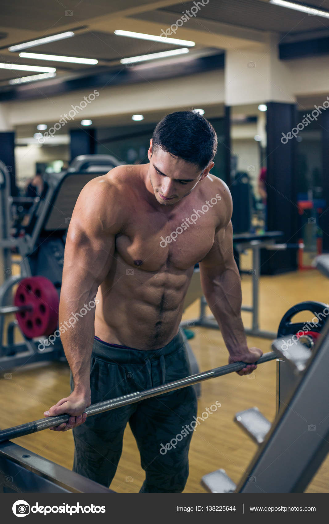 Naked bodybuilder tired. fun in the gym. healthy lifestyle. Stock Photo ...