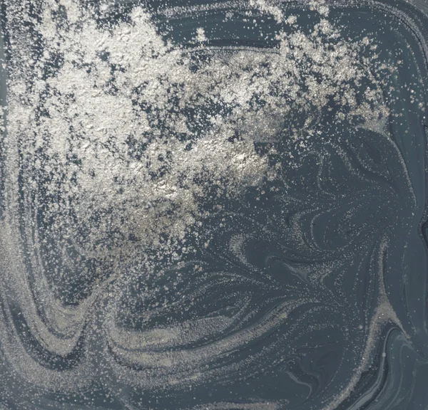 Liquid gold marbled pattern. Pale blue background - Stock Image ...