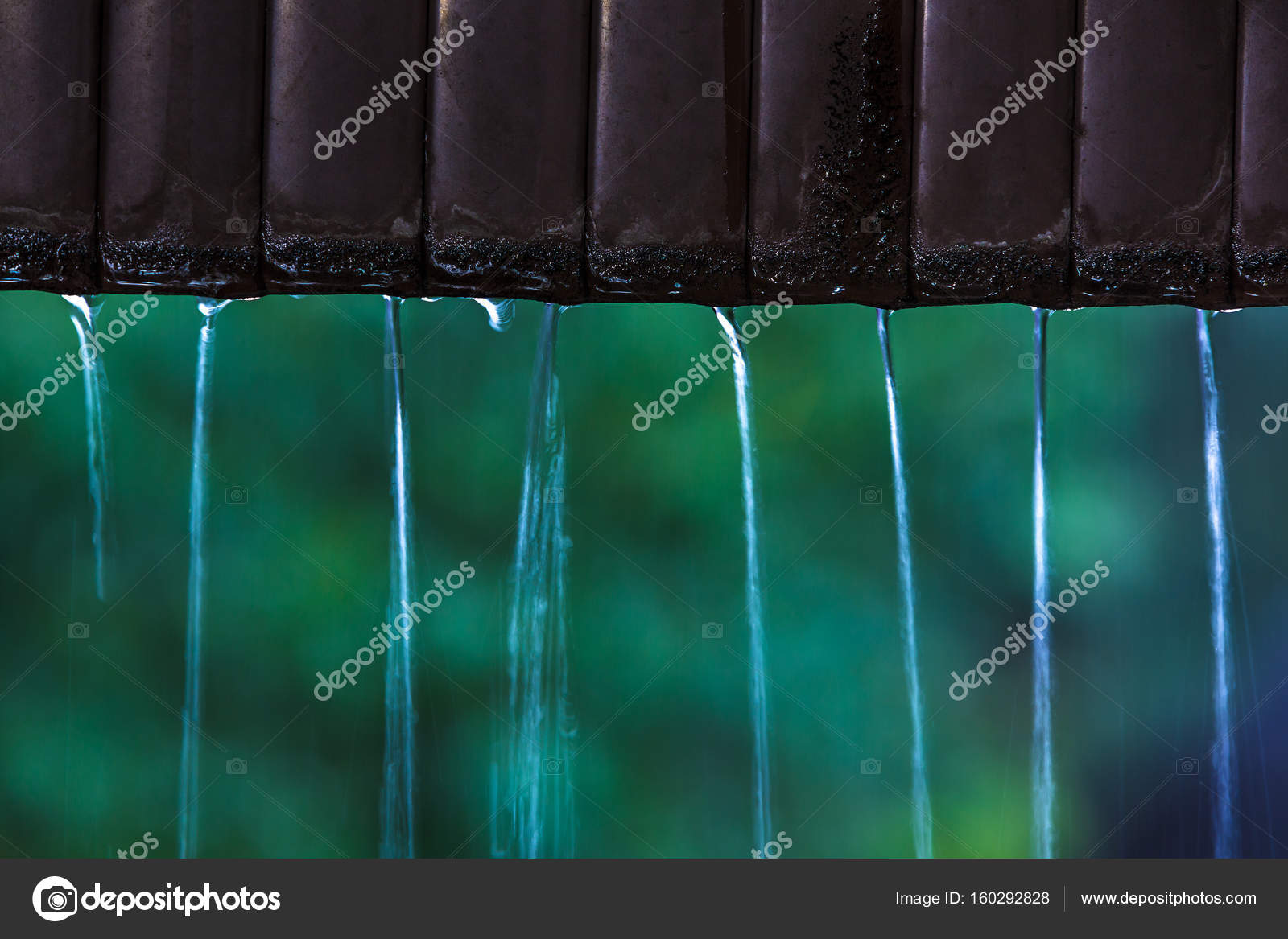 Rain coming down from rusted metal roof — Stock Photo © cpoungpeth ...