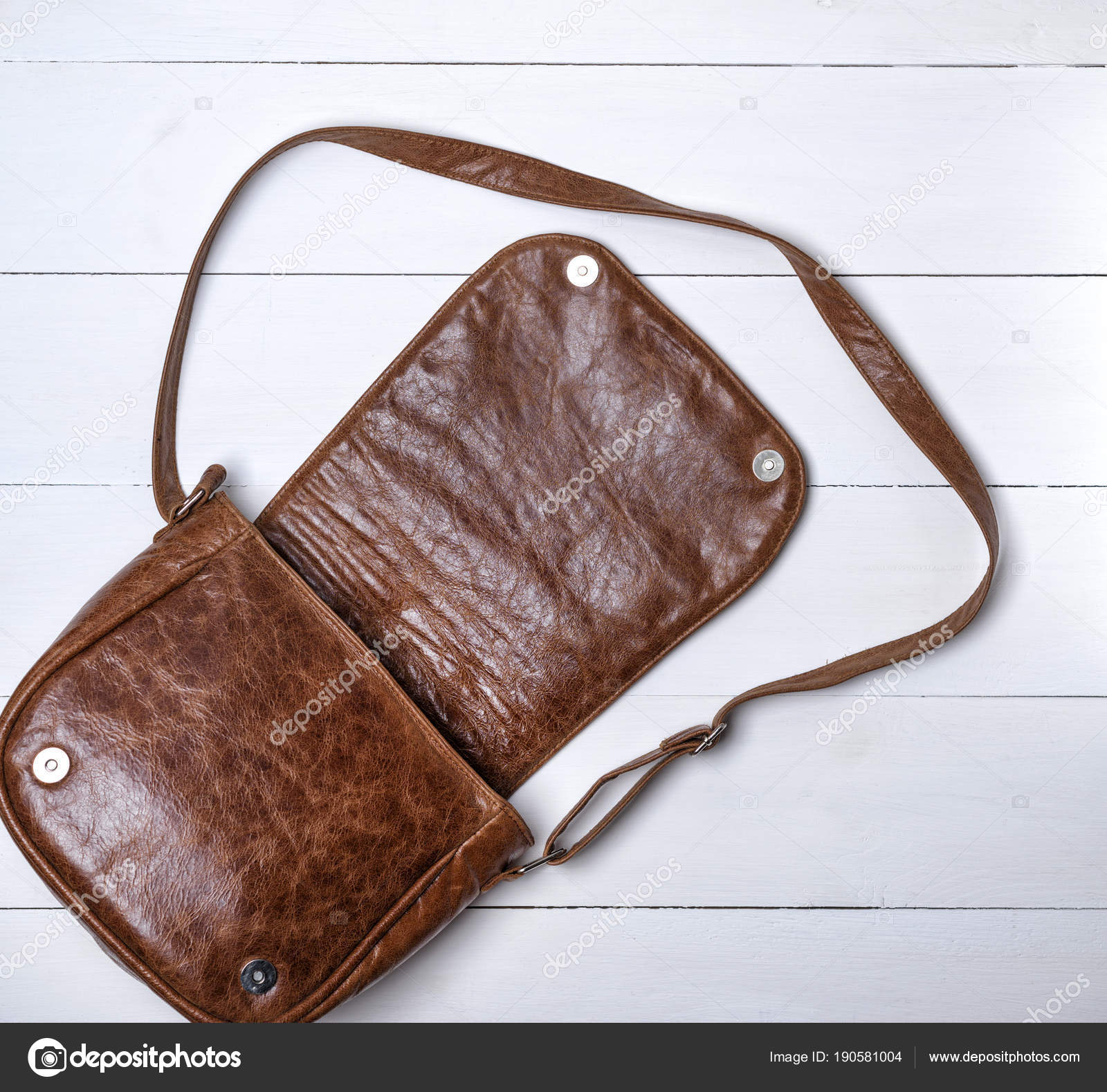 Open female brown leather bag — Stock Photo © nndanko.gmail.com #190581004