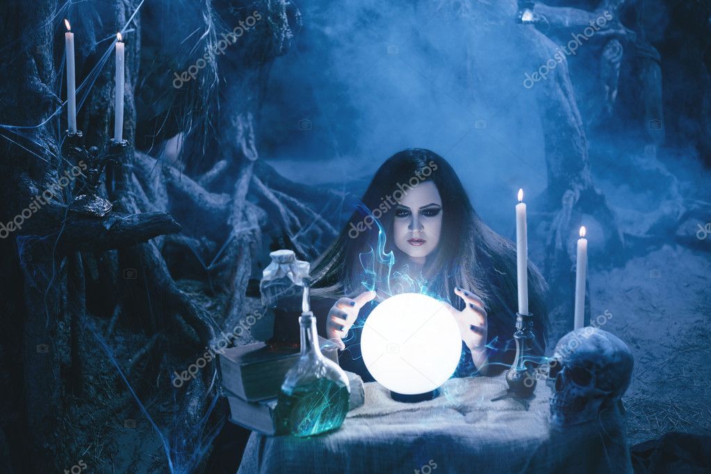 Attractive witch doing magic in the magic lair. Stock Photo by ...