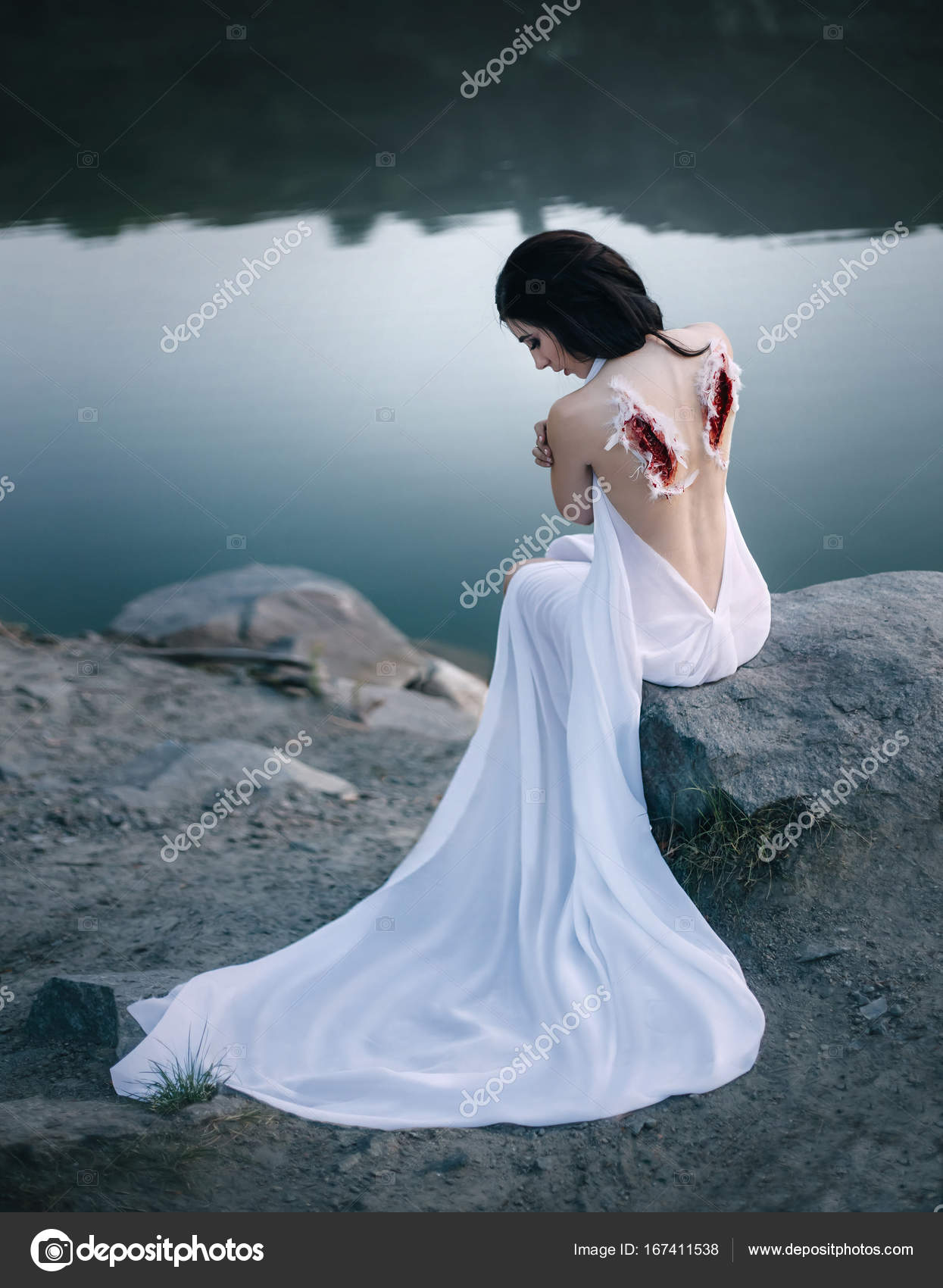 Fallen Angel Wings Torn Off