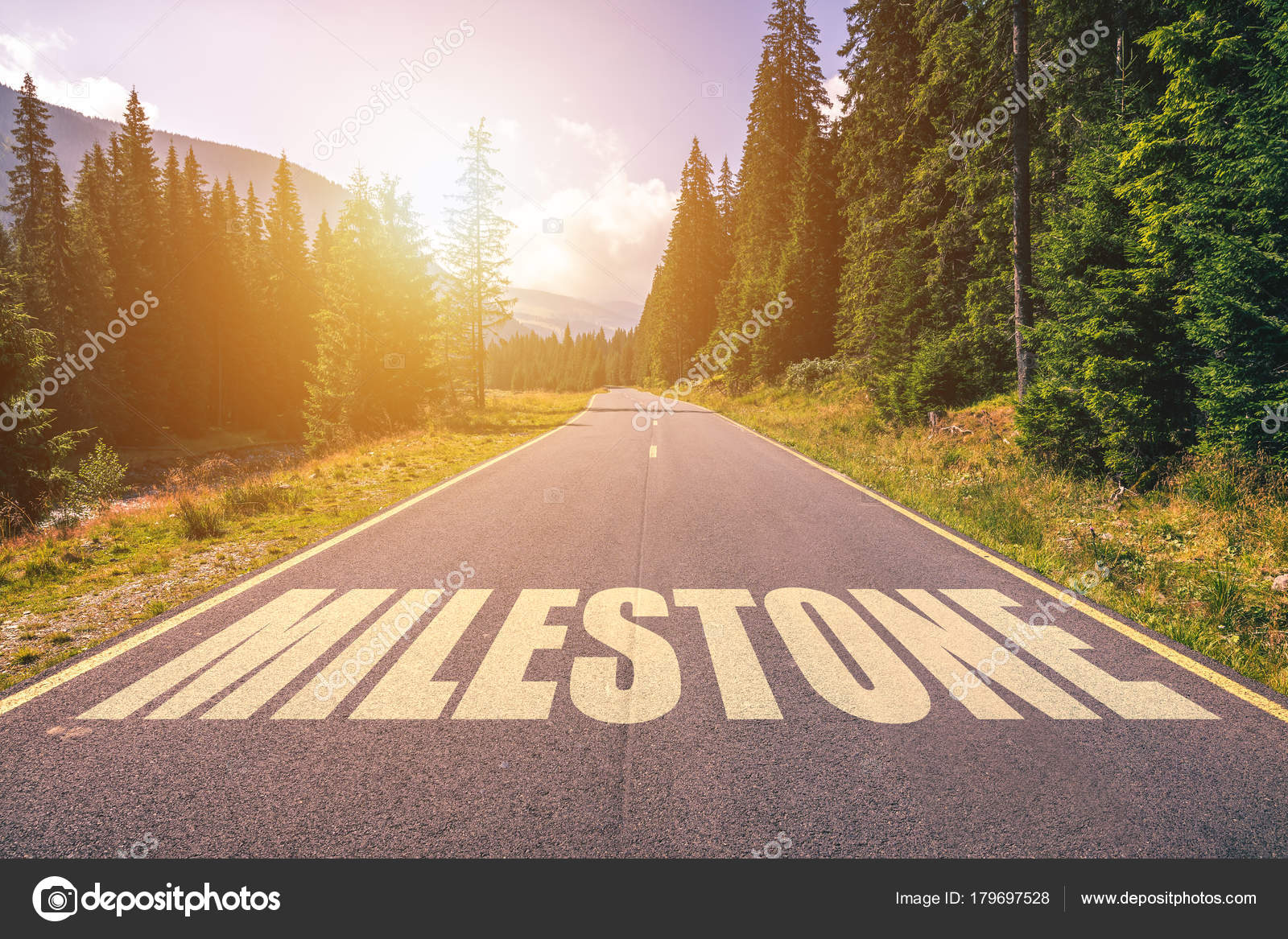 Asphalt road with arrow guideline and Milestone letters painted Stock ...