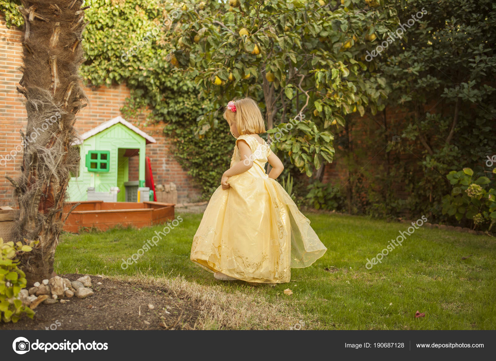 Rear View Girl Princess Costume Dancing Outdoors Stock Photo by ...