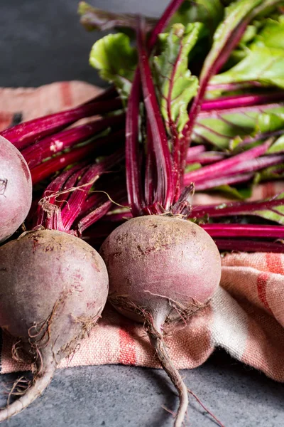 Young raw red beets roots with leaves, new harvest - Stock Image ...