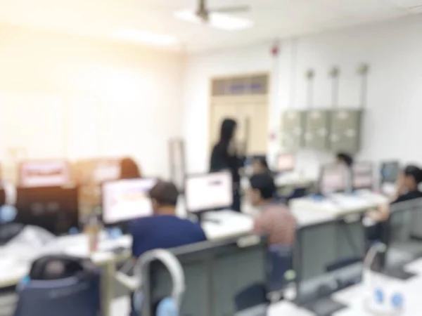 Blurred image of learning group of students in classroom. Study and ...