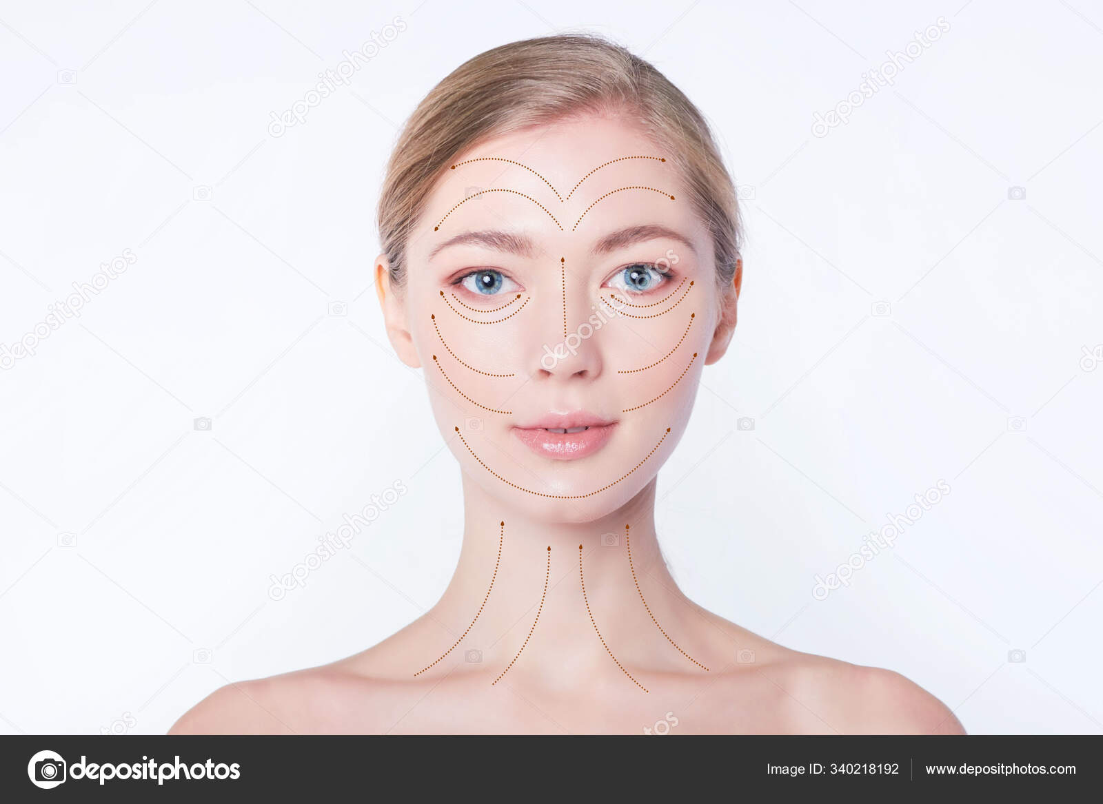 Portrait of a young beautiful woman with drawn massage lines on her ...