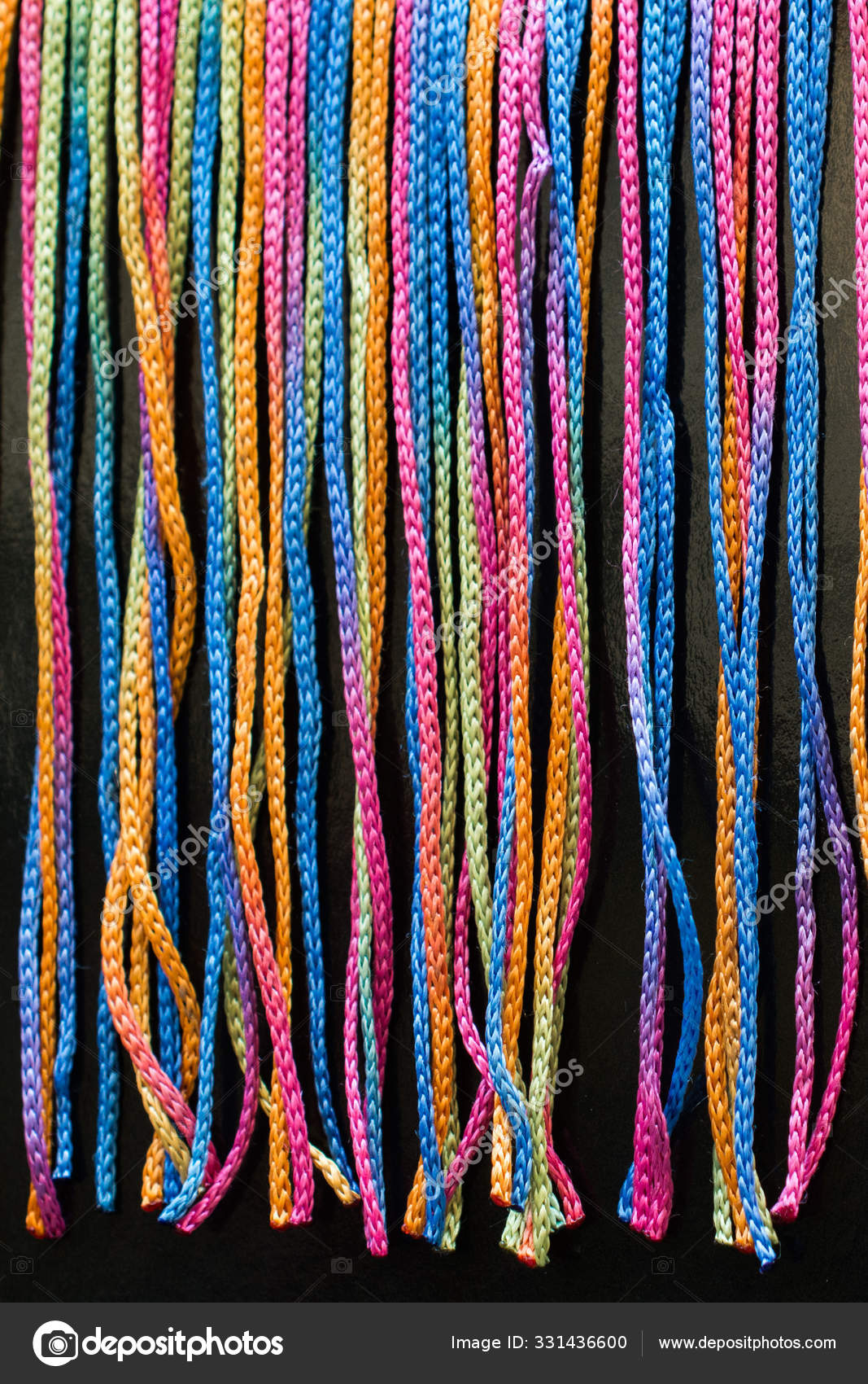 Lots of colorful braided strings on display Stock Photo by ©turgayada ...