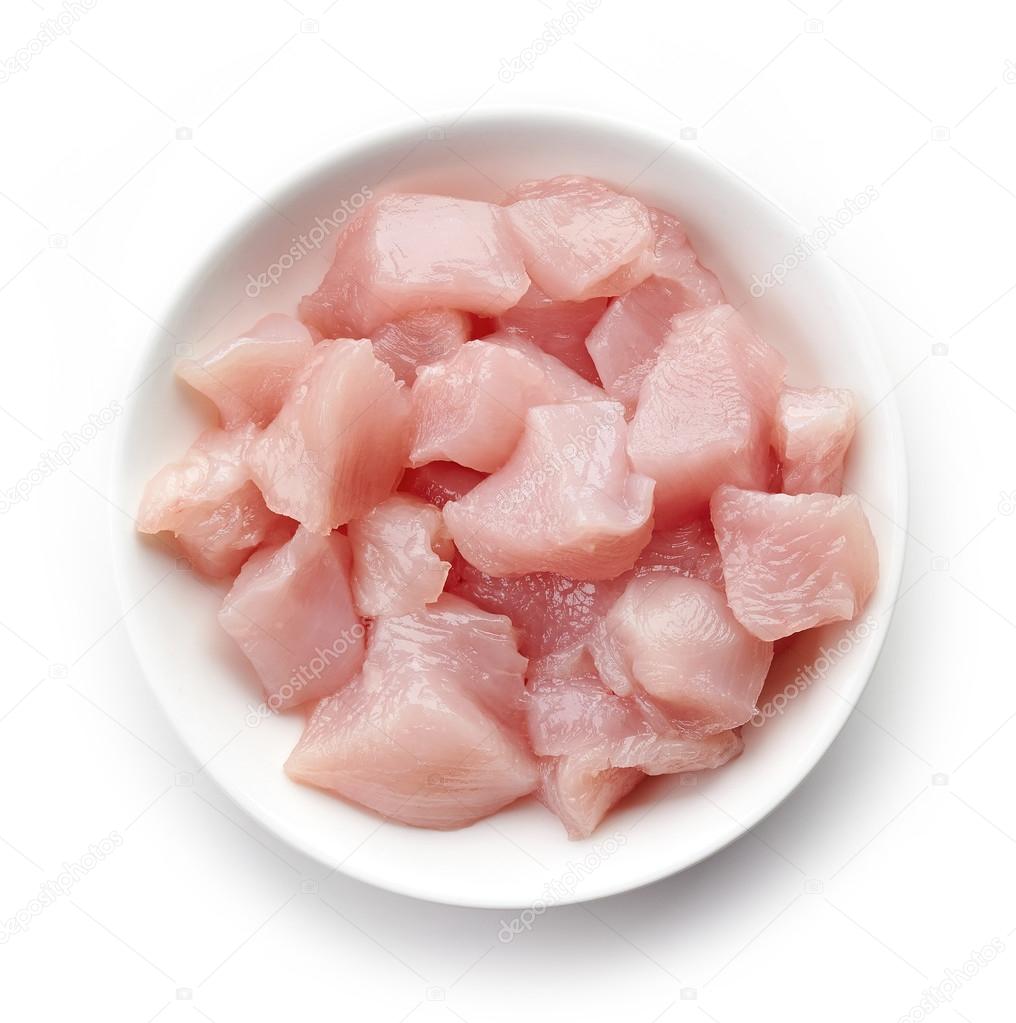 Raw cut chicken fillet in white bowl, from above Stock Photo by ...