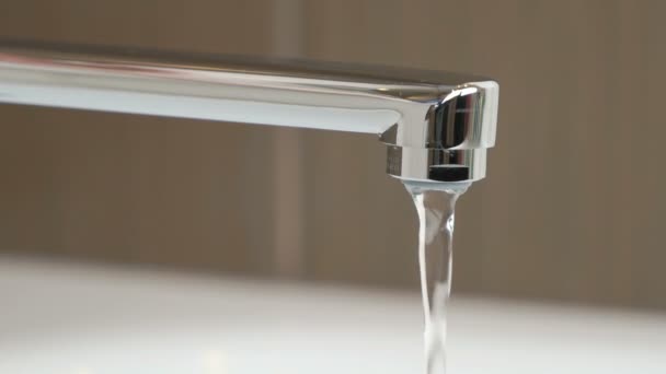 Weak stream of water pouring from the chrome tap — Stock Video ...