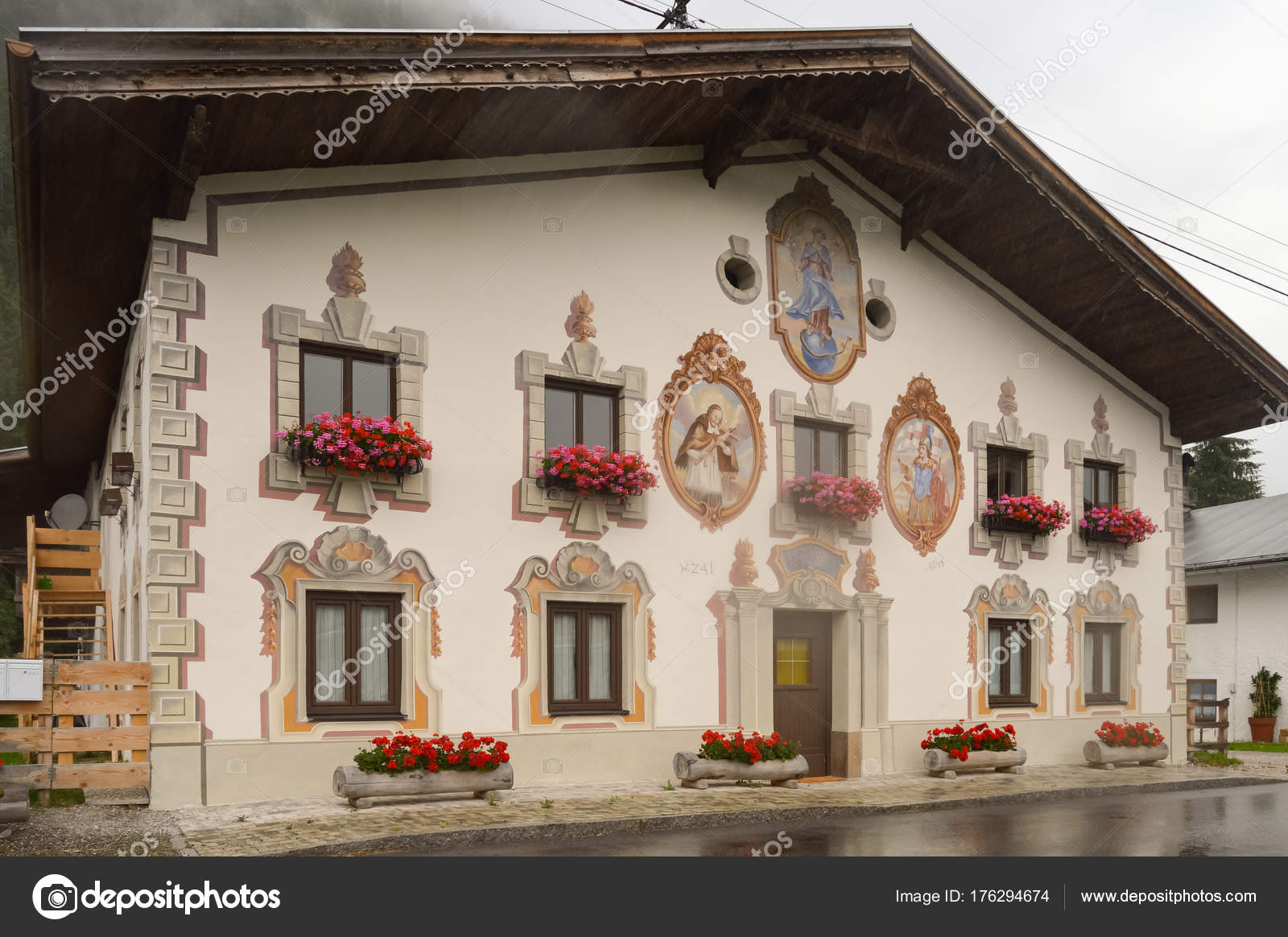 Traditional architecture in the Austrian Tyrol with paintings on ...