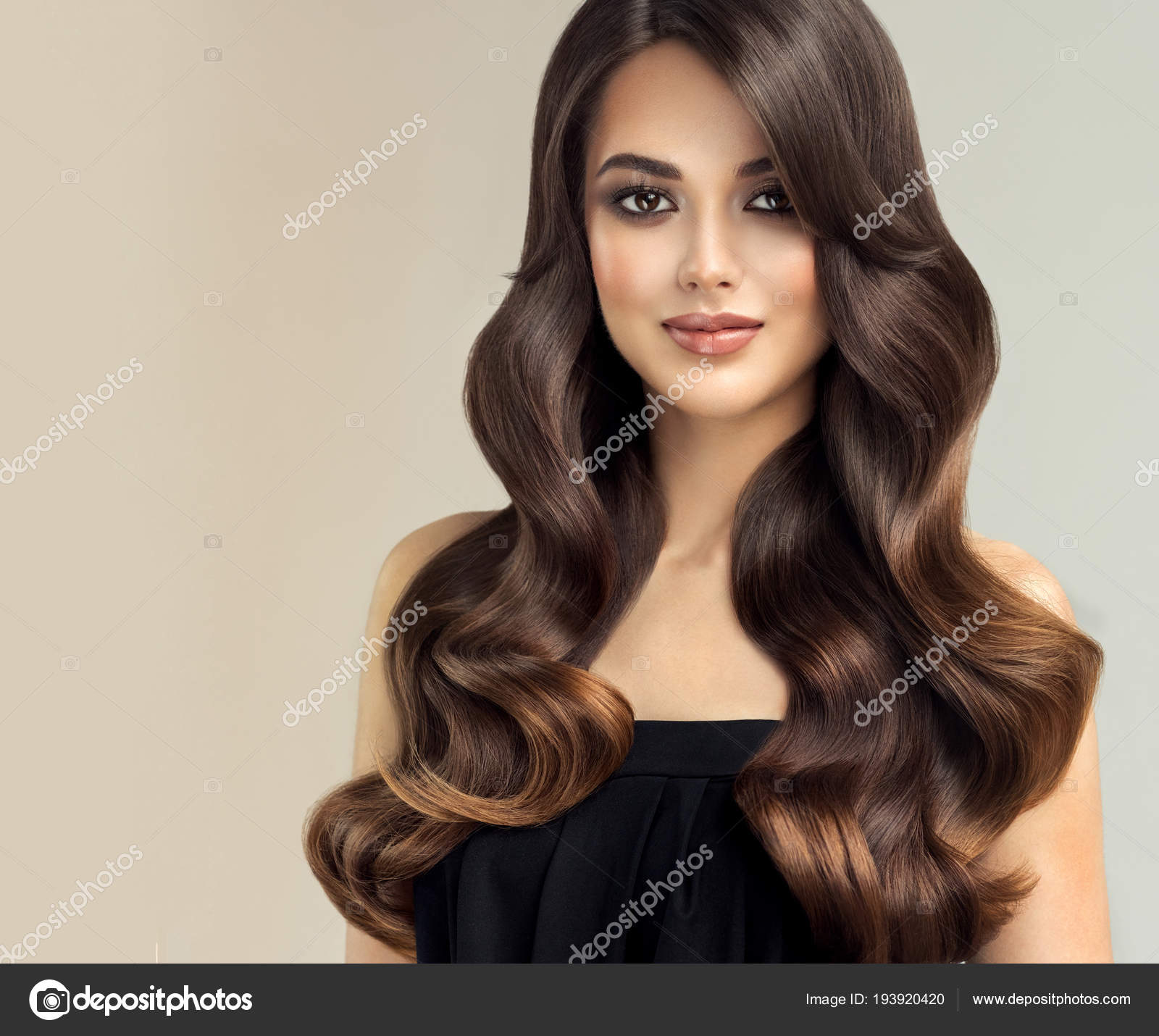 Brunette Girl Long Healthy Shiny Curly Hair Beautiful Model Woman Stock