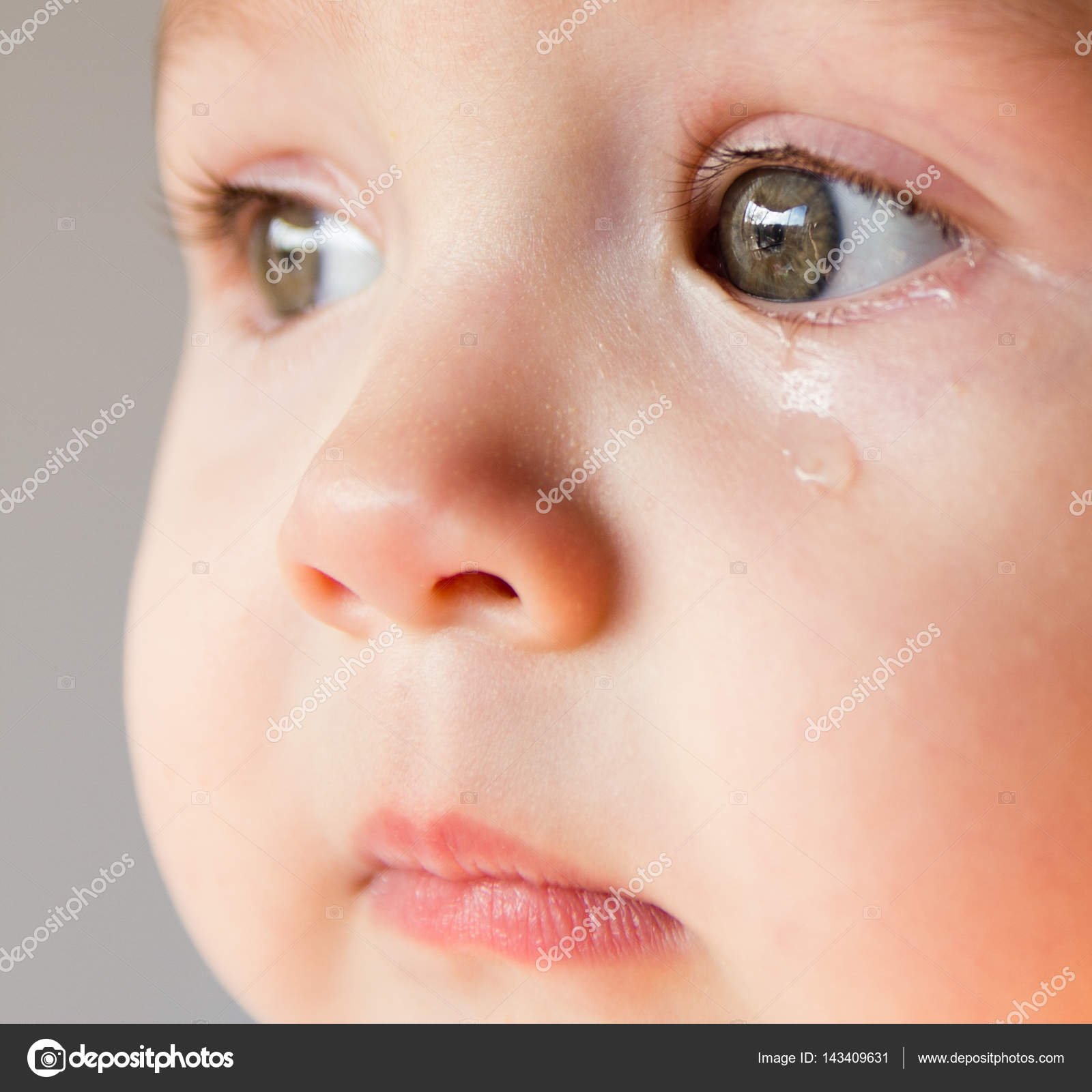 Sad face baby. A tear on the face ⬇ Stock Photo, Image by © Andrey ...