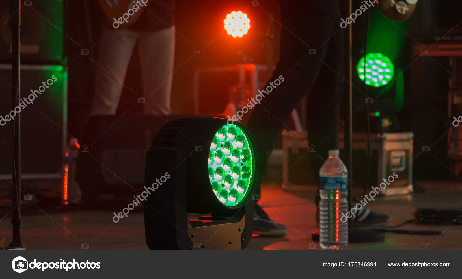 Rotating LED projector illuminates the public in green — Stock ...
