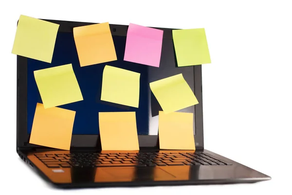 Laptop full display in reminders with yellow stickers notes on desk ...