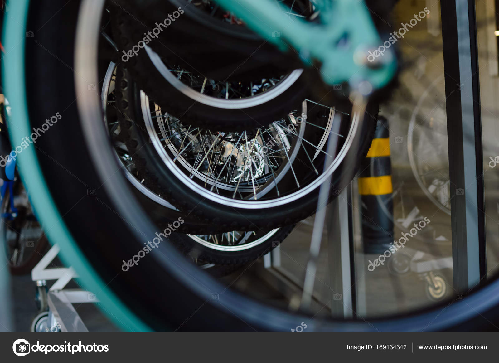 Close up on modern bikes detail over show room abstract shelf ...