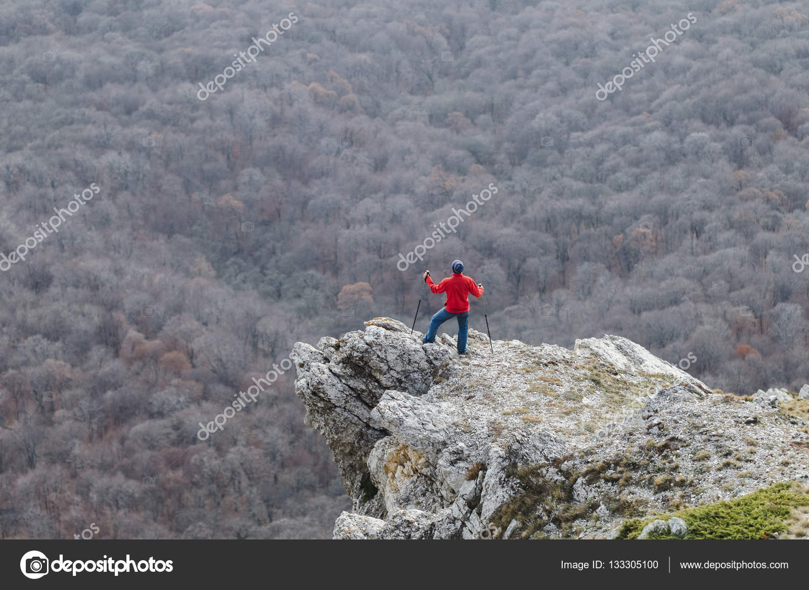 Man climbing to the edge of rock — Stock Photo © olegbreslavtsev #133305100